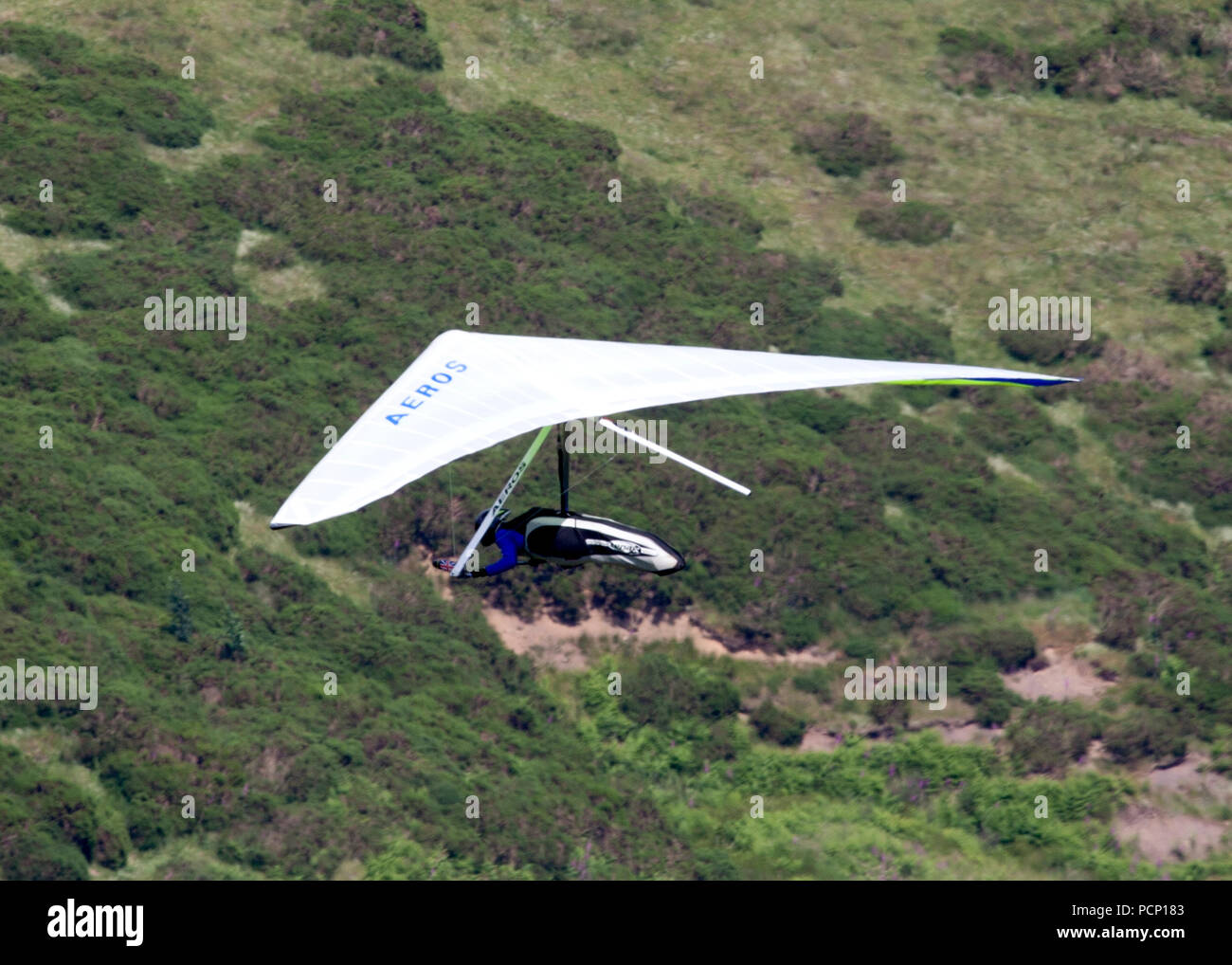 Hang glider over cold side view to back tor hi-res stock photography ...