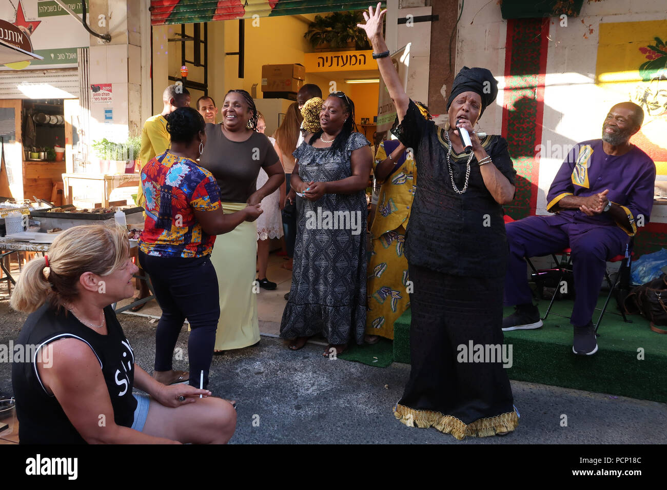 Members of the Black Hebrew Israelites community in Israel singing and ...