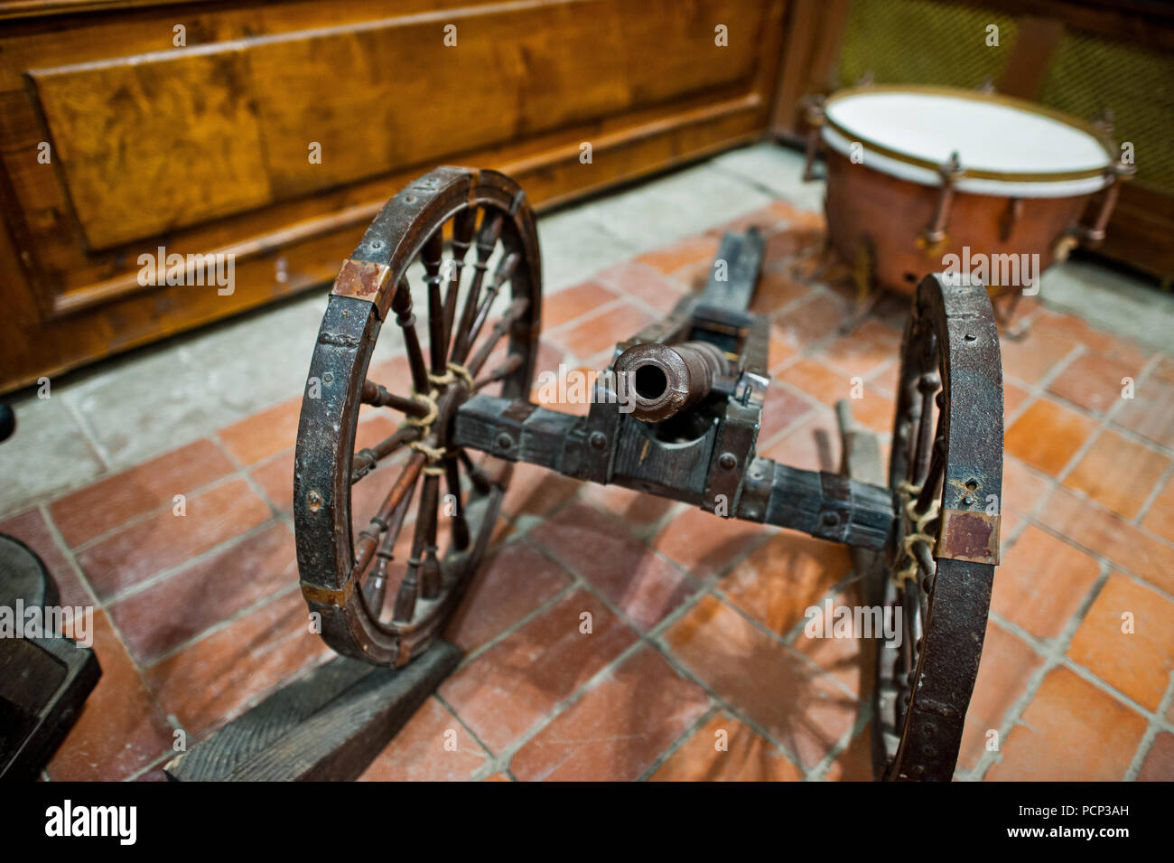 Very old cannon made of iron in museum Stock Photo - Alamy