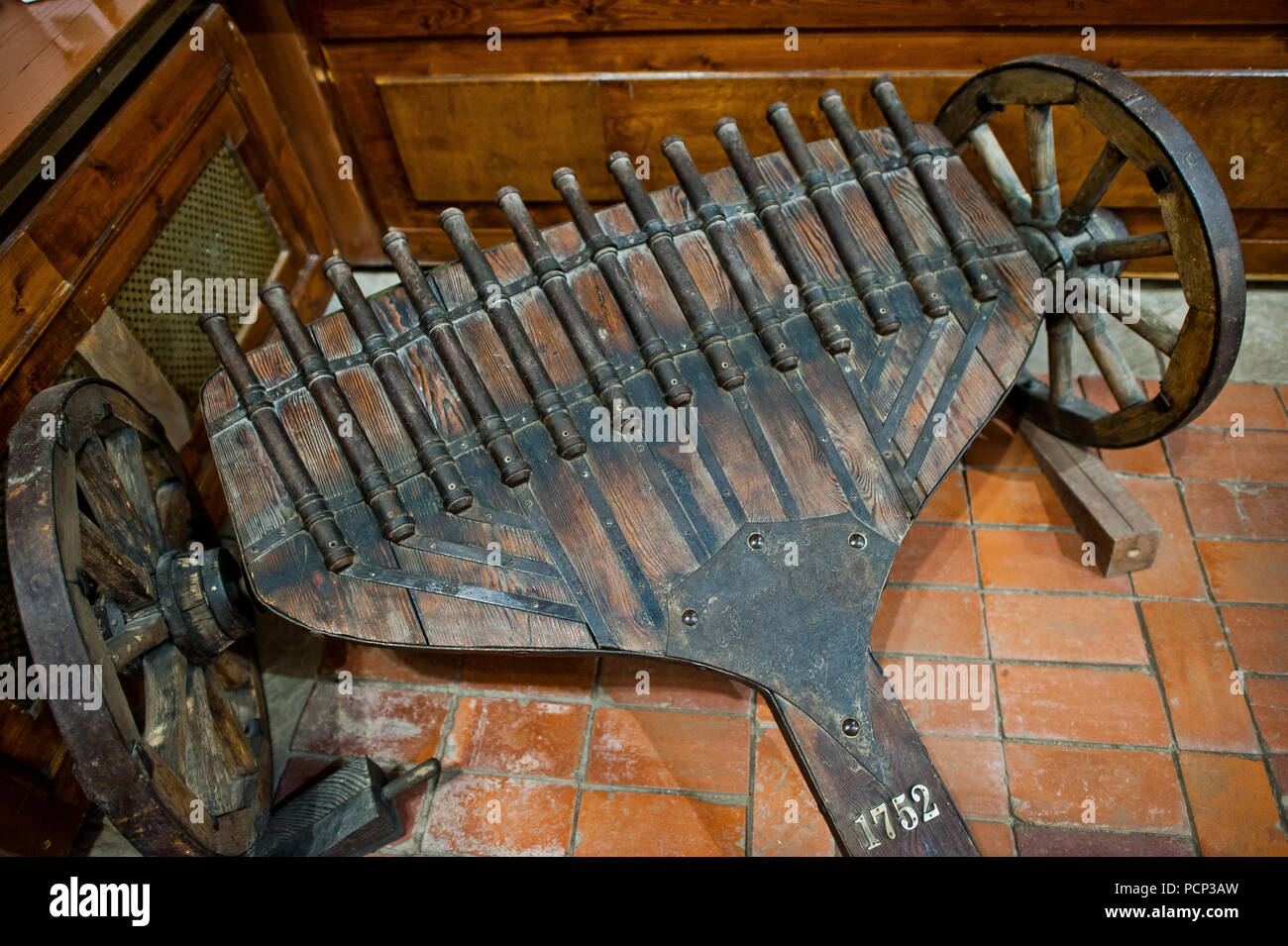 Very old cannon made of iron in museum Stock Photo - Alamy