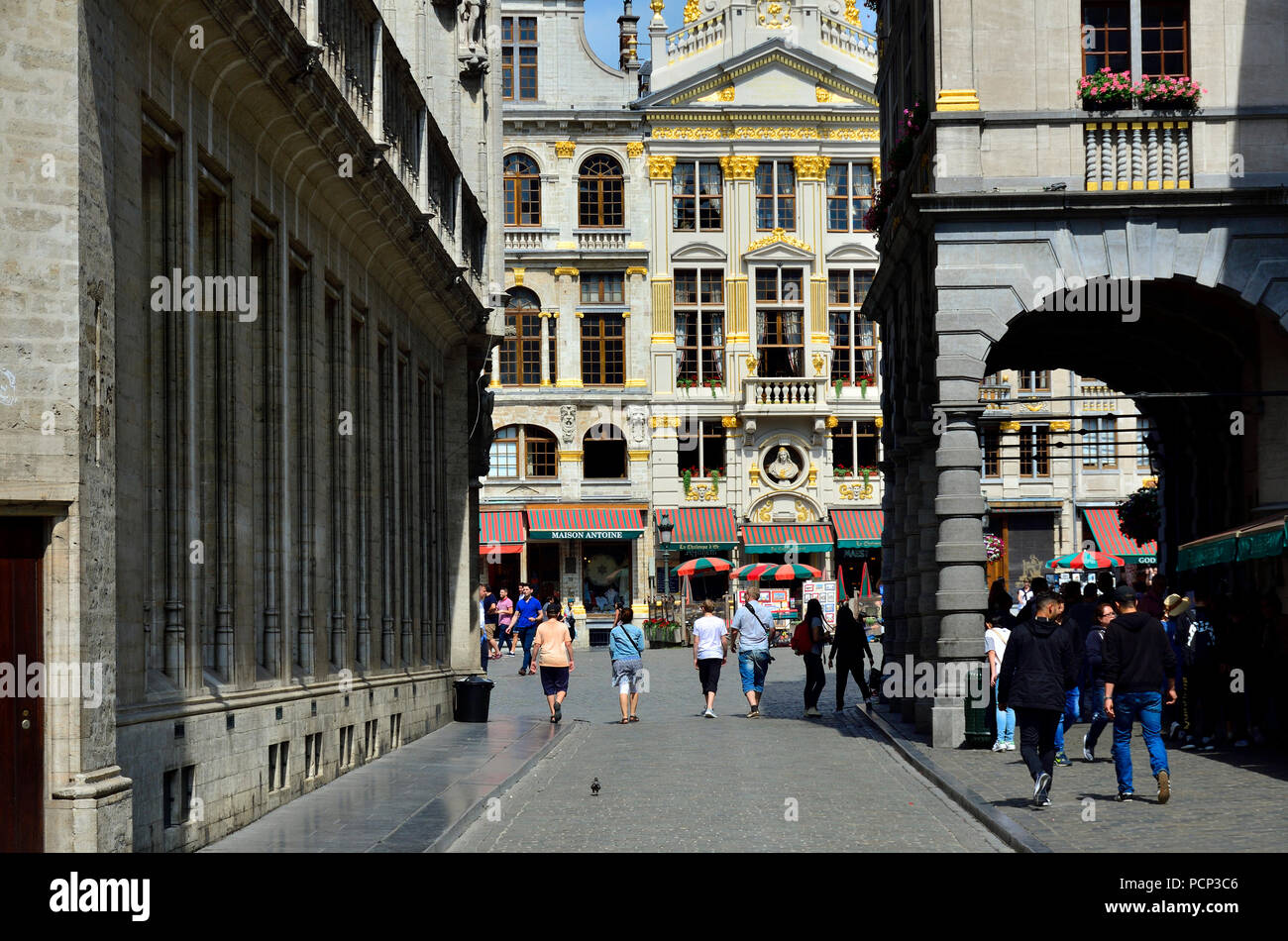 Brussels, Belgium. People walking into the Grand Place from Rue de l ...