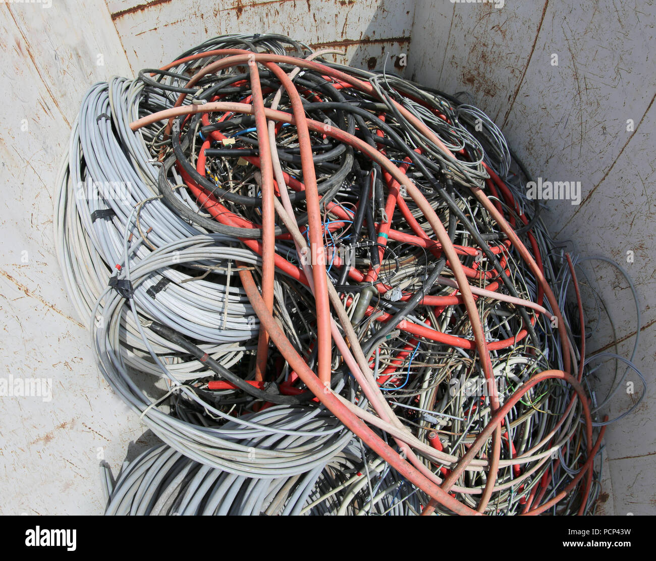 containers with broken electric cable and electric wires for the ...