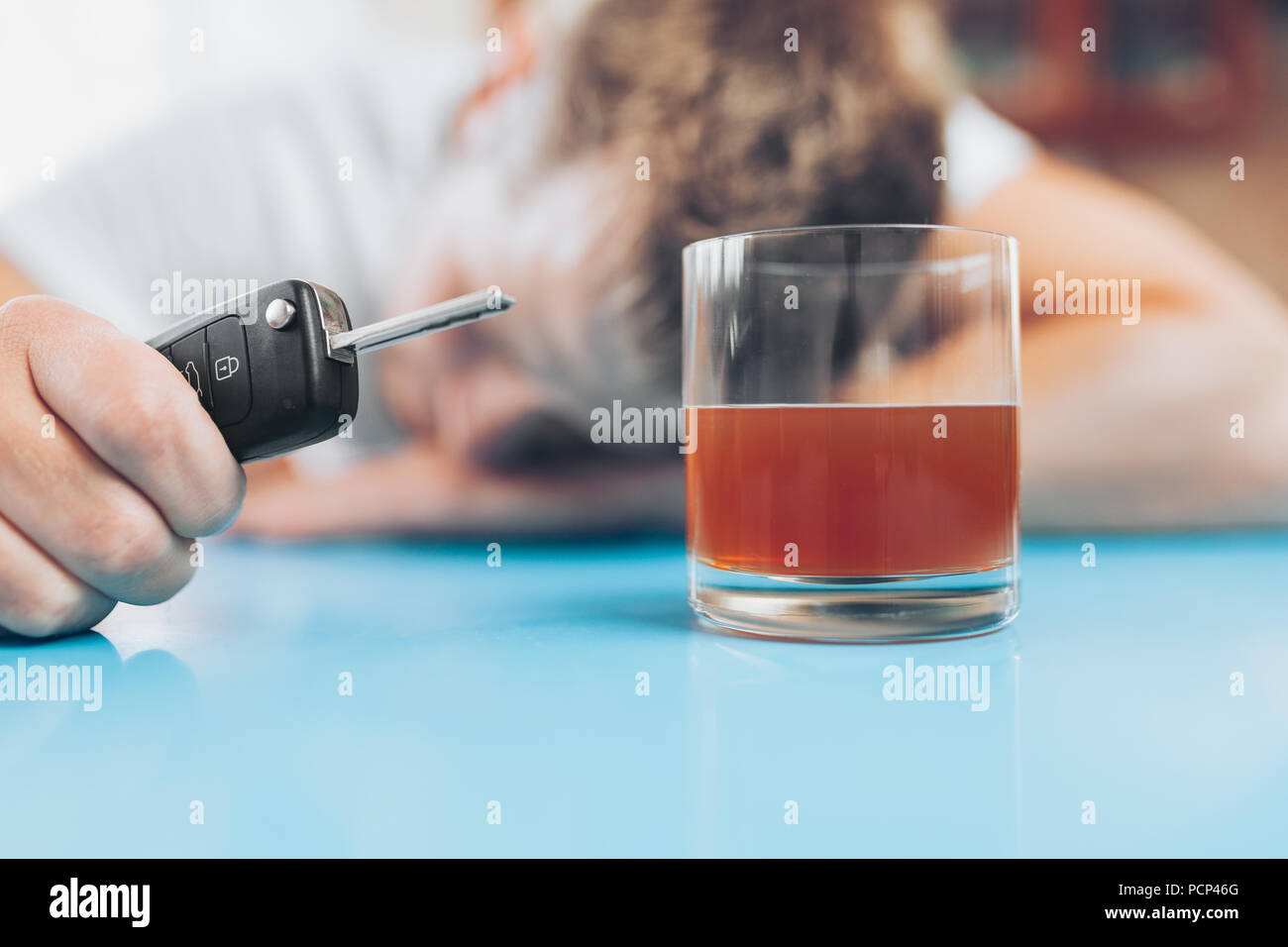 Drunk man at the bar intends to drive back home Stock Photo - Alamy