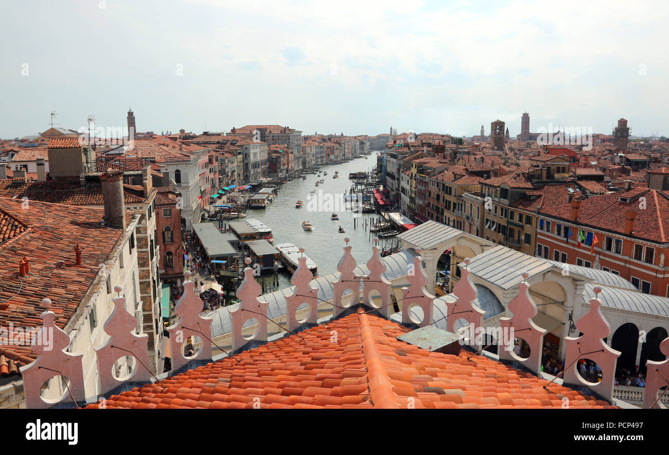 venice roofs in Italy with the Rialto bridge and the ships on the Grand ...