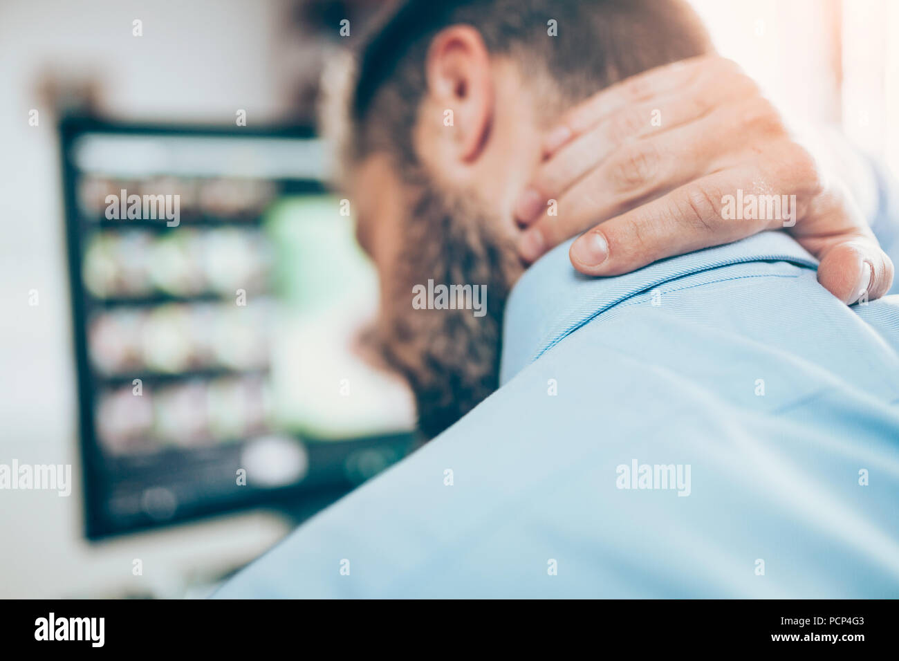 Stiff neck hi-res stock photography and images - Alamy