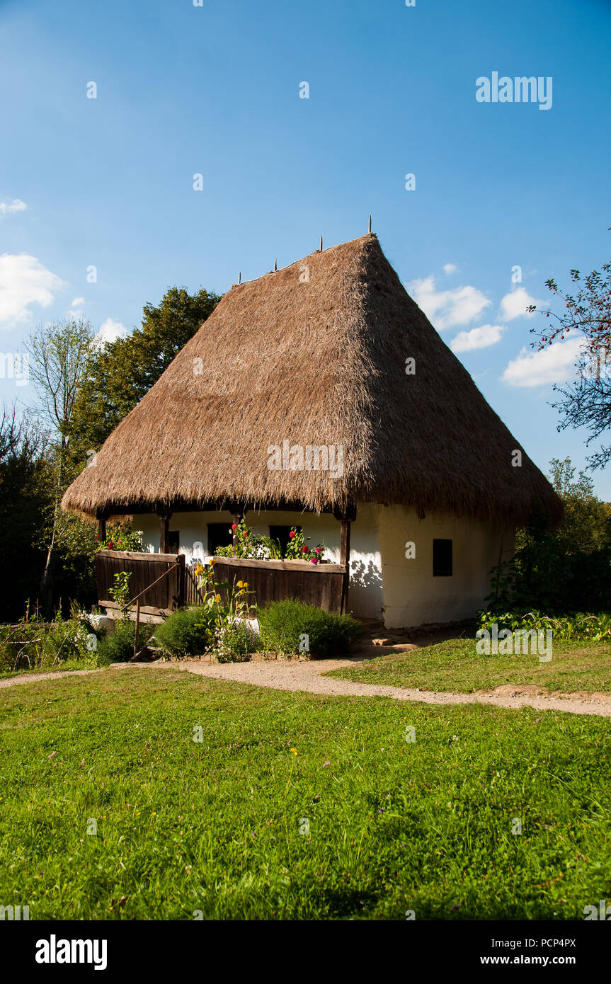 Traditional house in Romania with a roof made out of straws Stock Photo ...