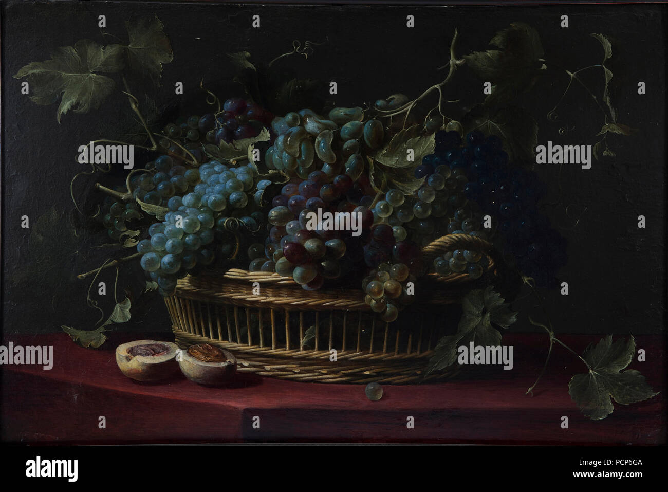 Still life with a basket of grapes Stock Photo - Alamy