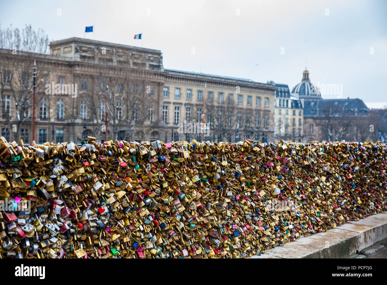 PARIS, FRANCE - MARCH, 2018: Love locks at Pont Neuf and the city of ...