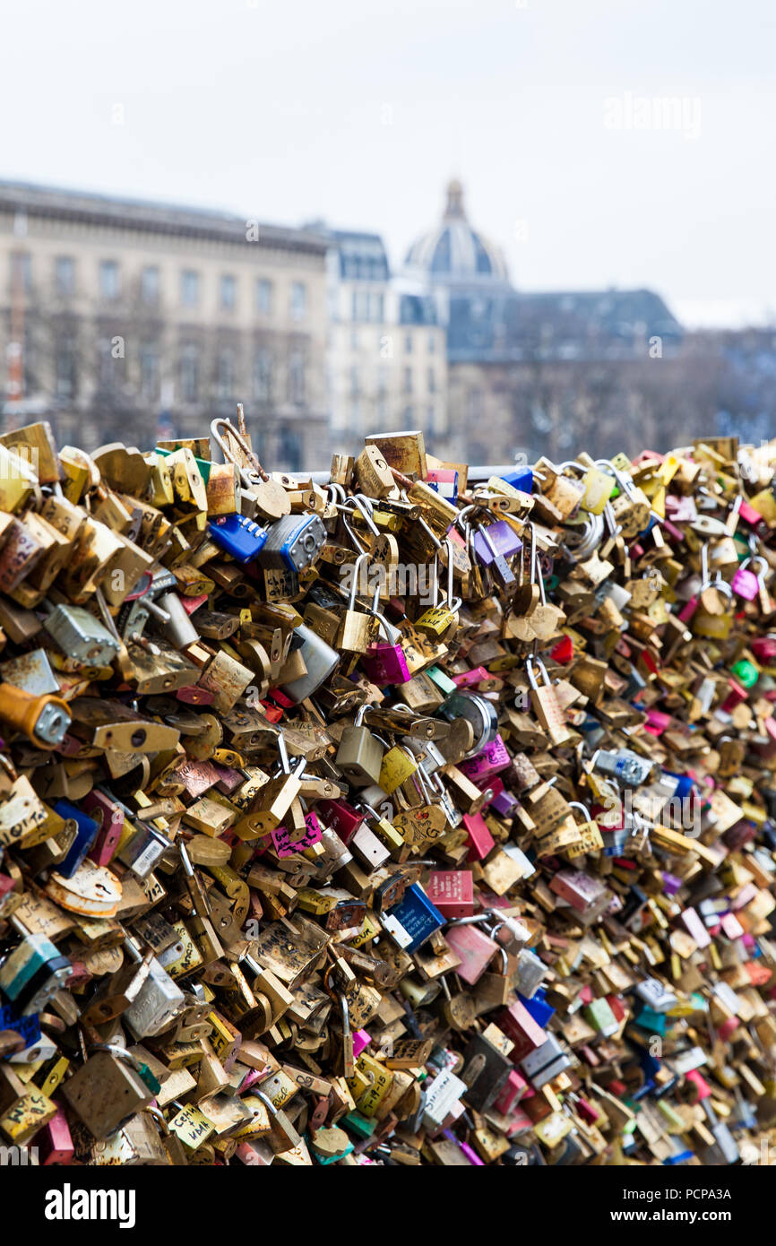 PARIS, FRANCE - MARCH, 2018: Love locks at Pont Neuf and the city of ...