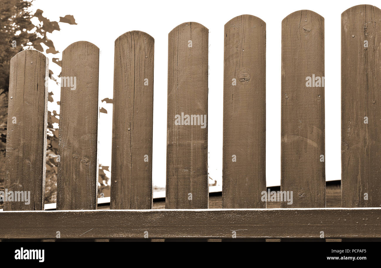 A detail of a wooden spruce fence of pale in sepia color Stock Photo ...
