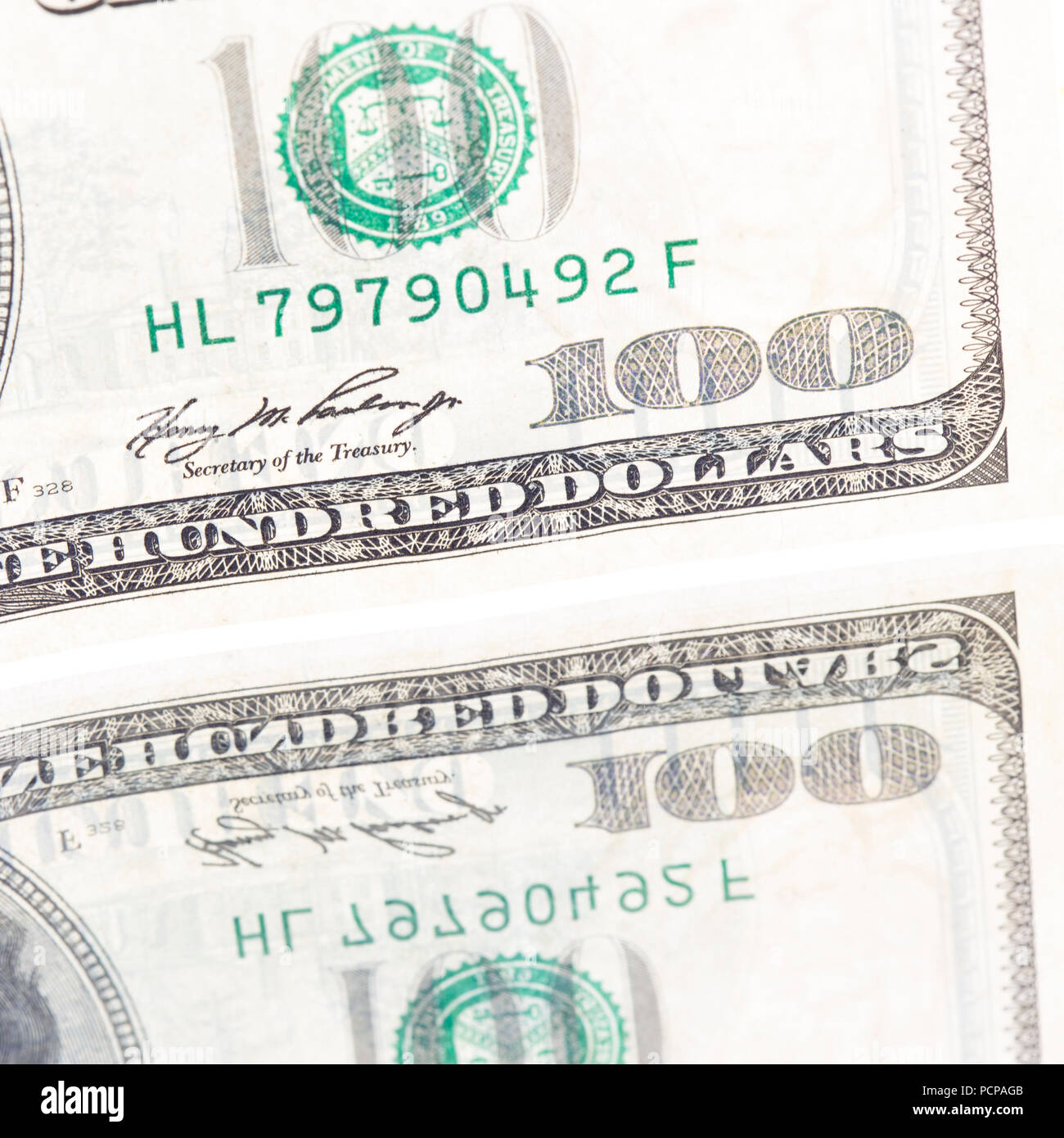 blurred dollar money background and mirror like concept of success ...