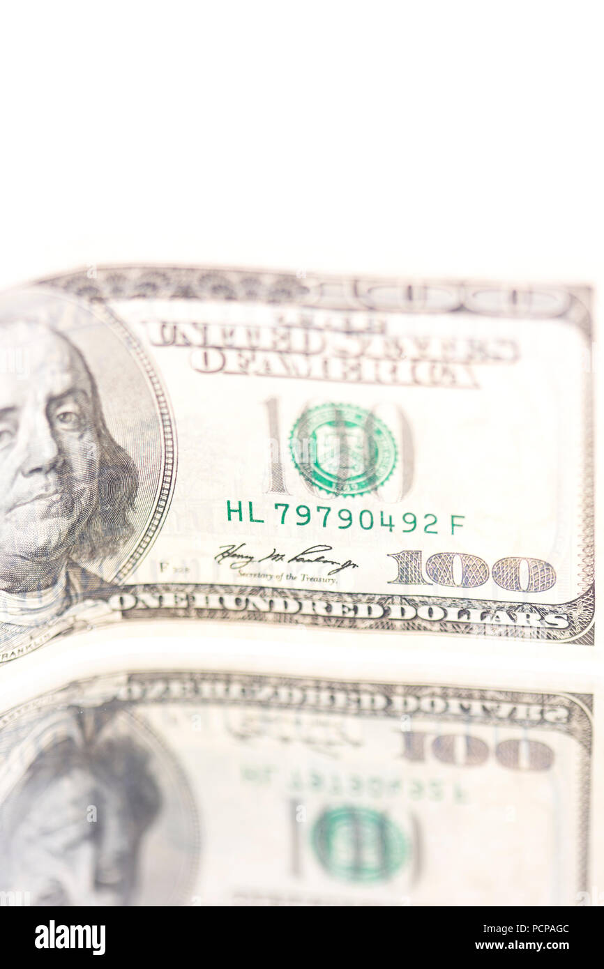 blurred dollar money background and mirror like concept of success ...