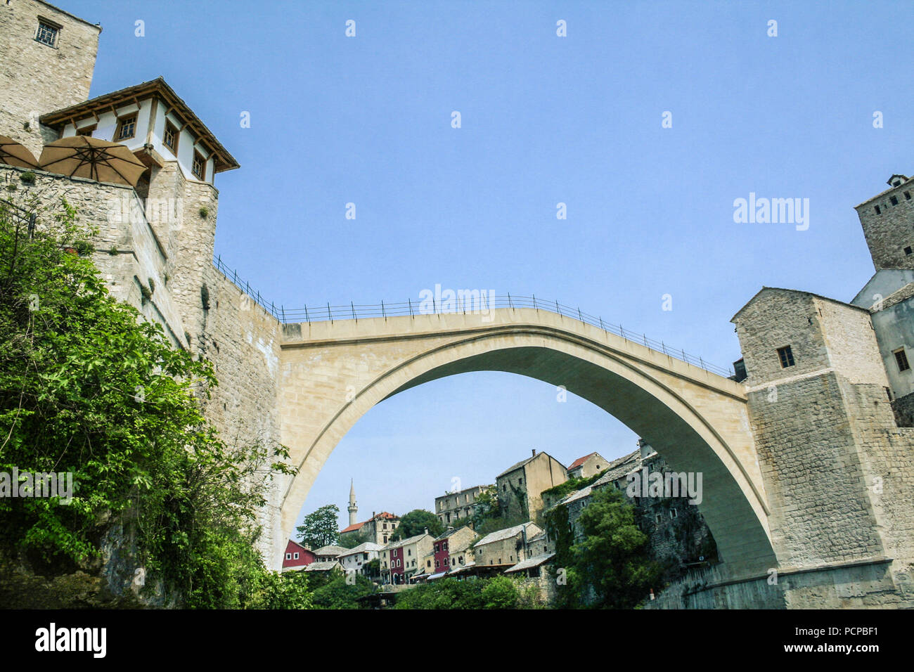 Old Bridge of Mostar during a sunny afternoon, with the old city ...