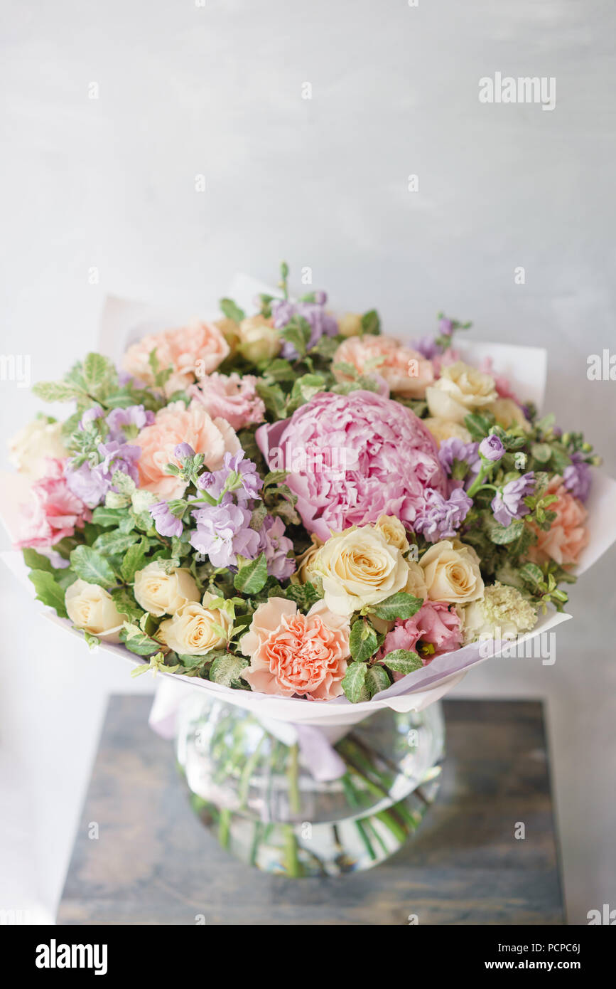 Beautiful spring bouquet. Arrangement with mix flowers. The concept of ...