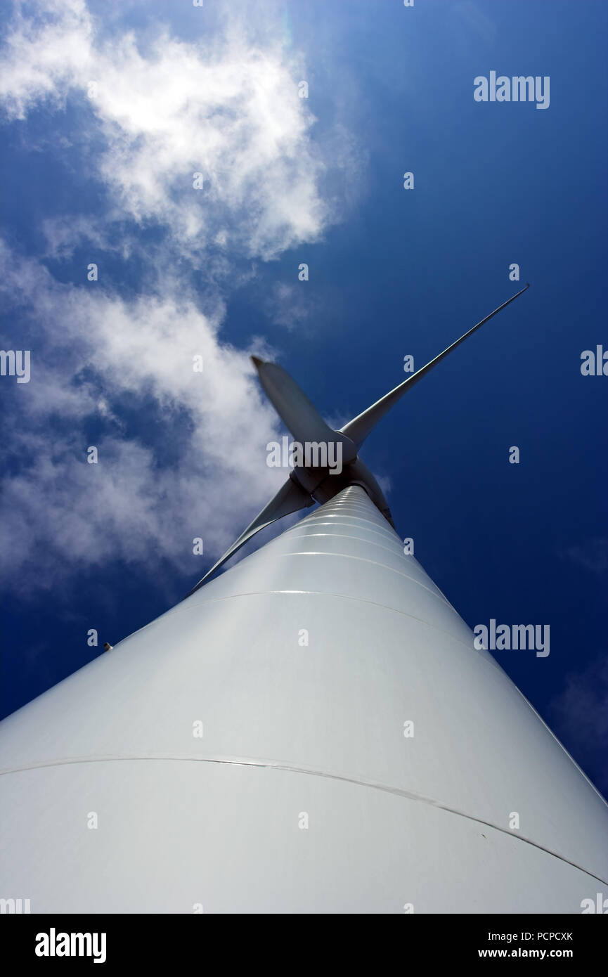 Wind generator against deep blue sky and cloud - a different ...
