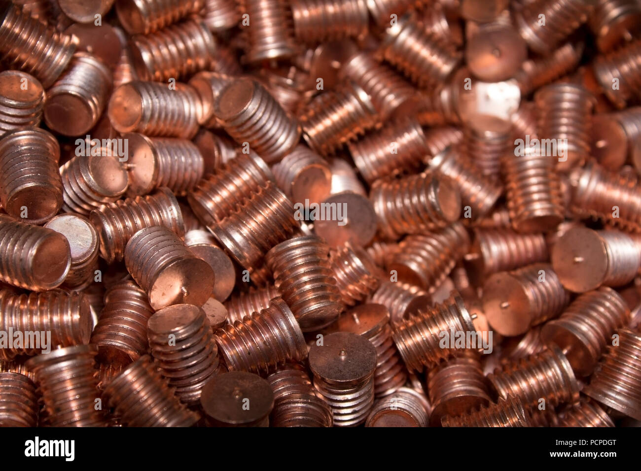 Pile of threaded copper metal screw bolts Stock Photo - Alamy