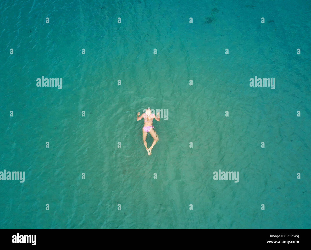 Woman from above swimming hi-res stock photography and images - Alamy