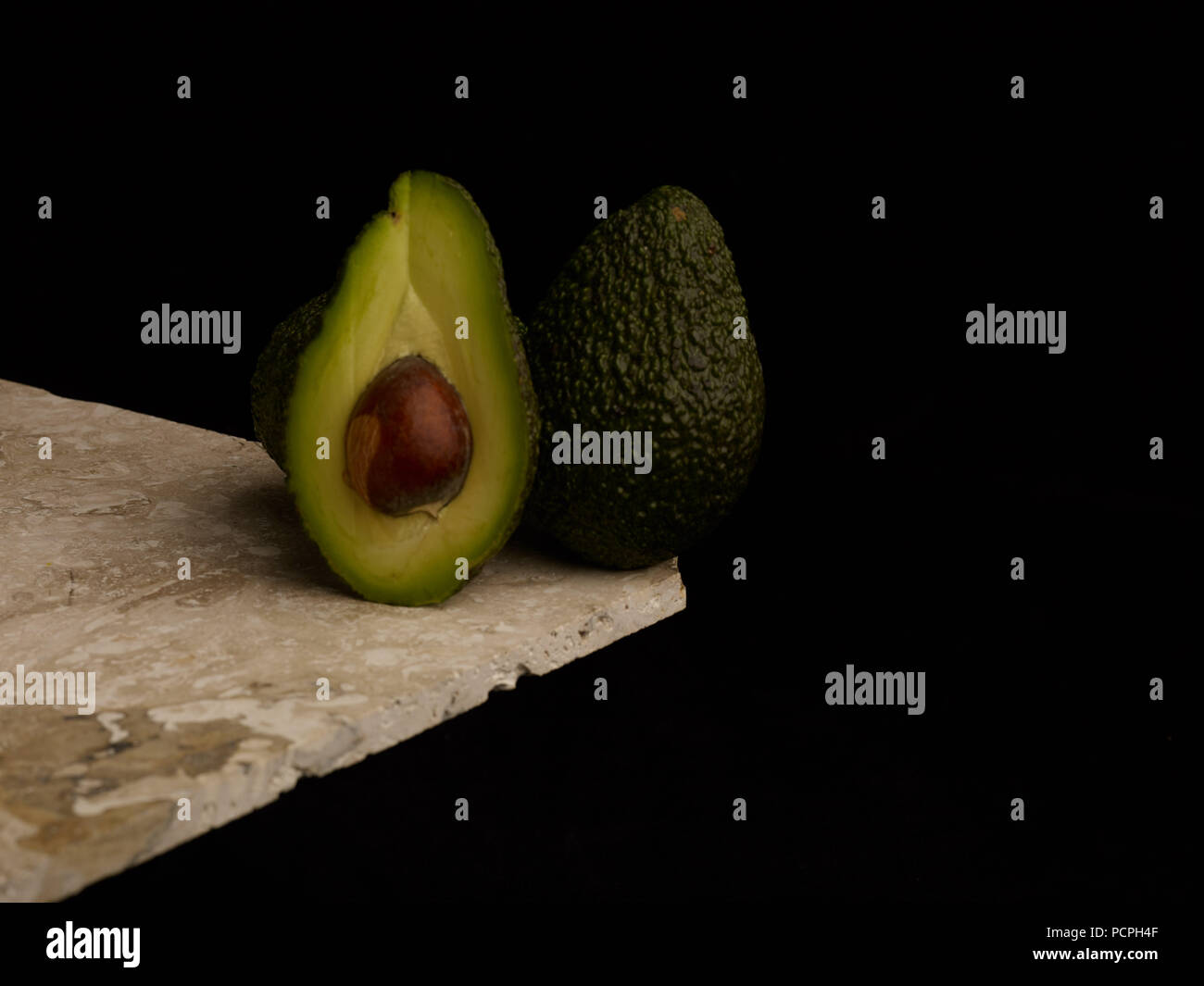 Avocado still life food photograph Stock Photo - Alamy