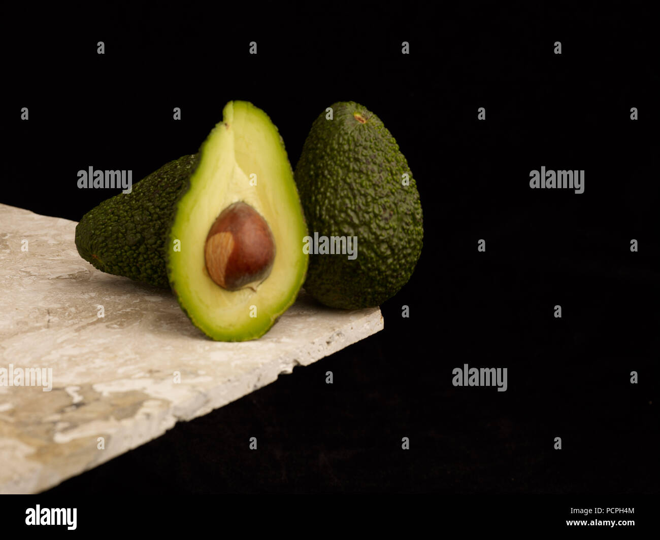 Avocado still life food photograph Stock Photo - Alamy