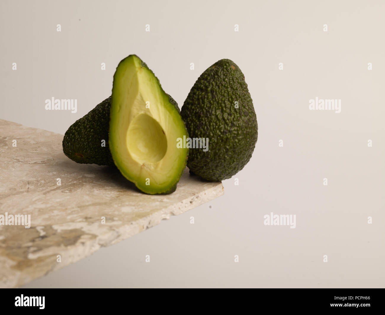 Avocado still life food photograph Stock Photo - Alamy