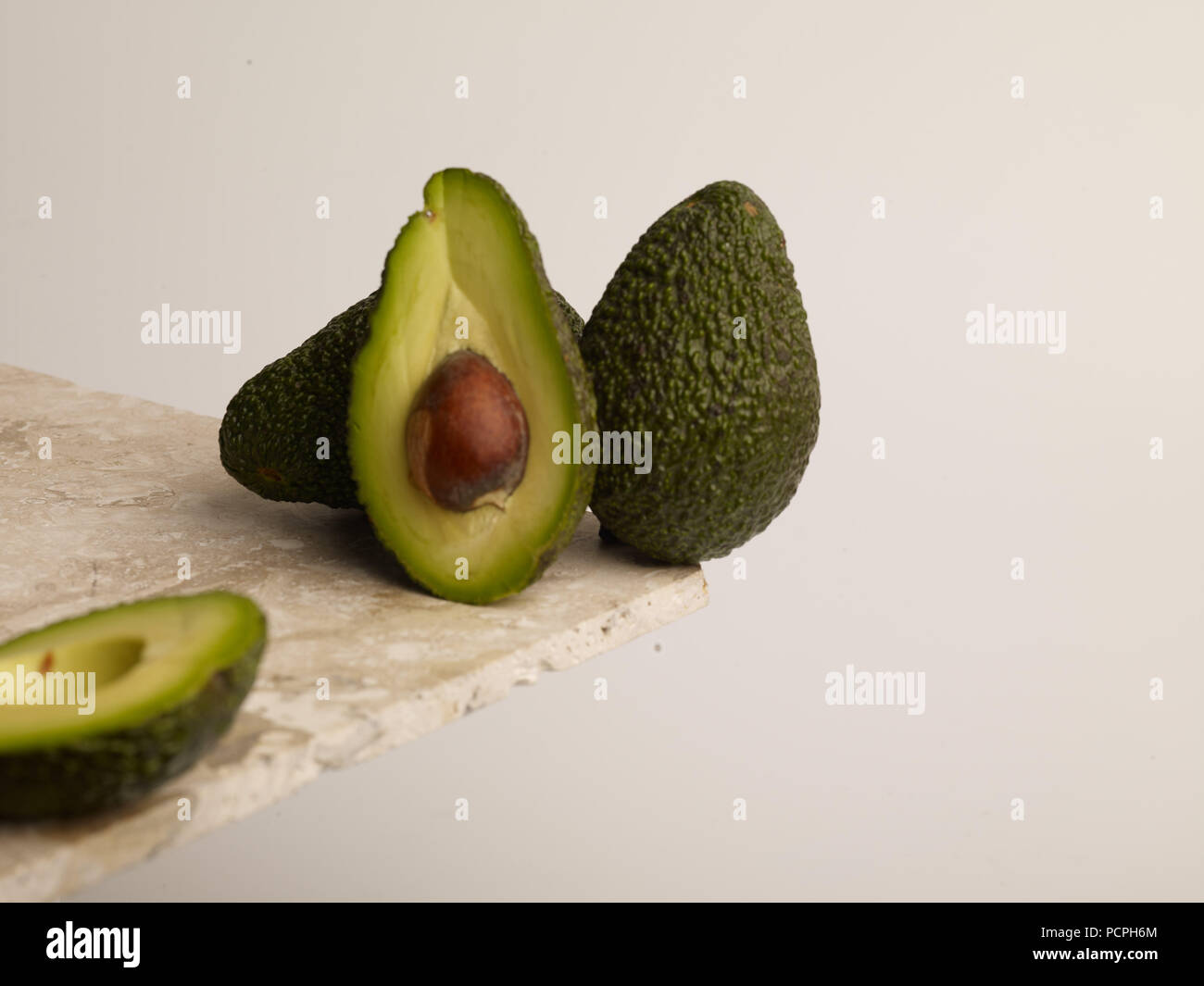 Avocado still life food photograph Stock Photo - Alamy