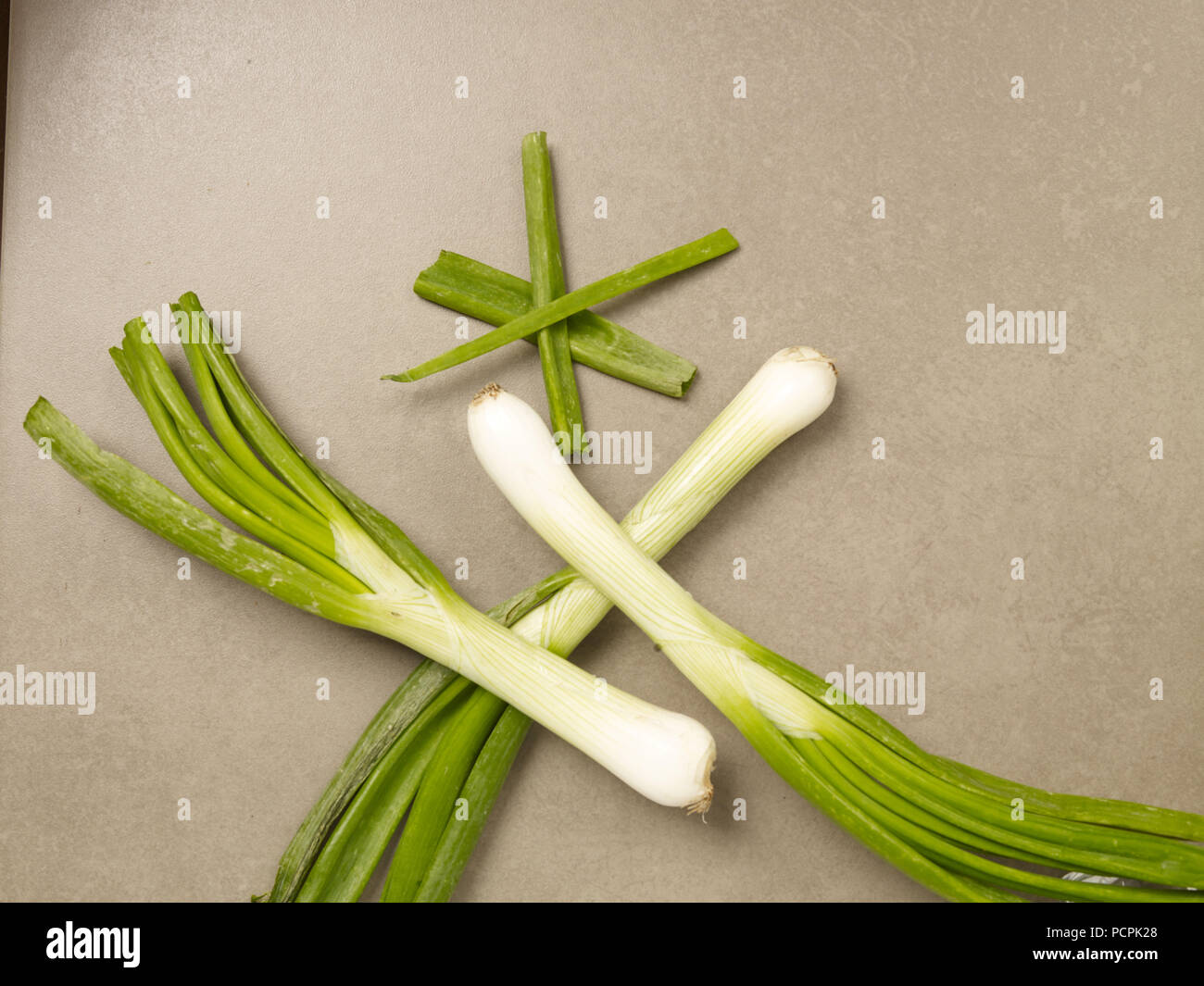 Spring onion stalks food still-life Stock Photo - Alamy