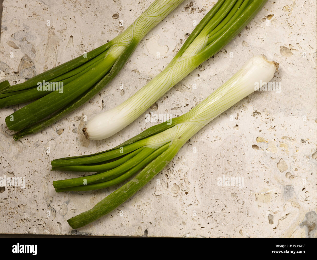 Spring onion stalks food still-life Stock Photo - Alamy