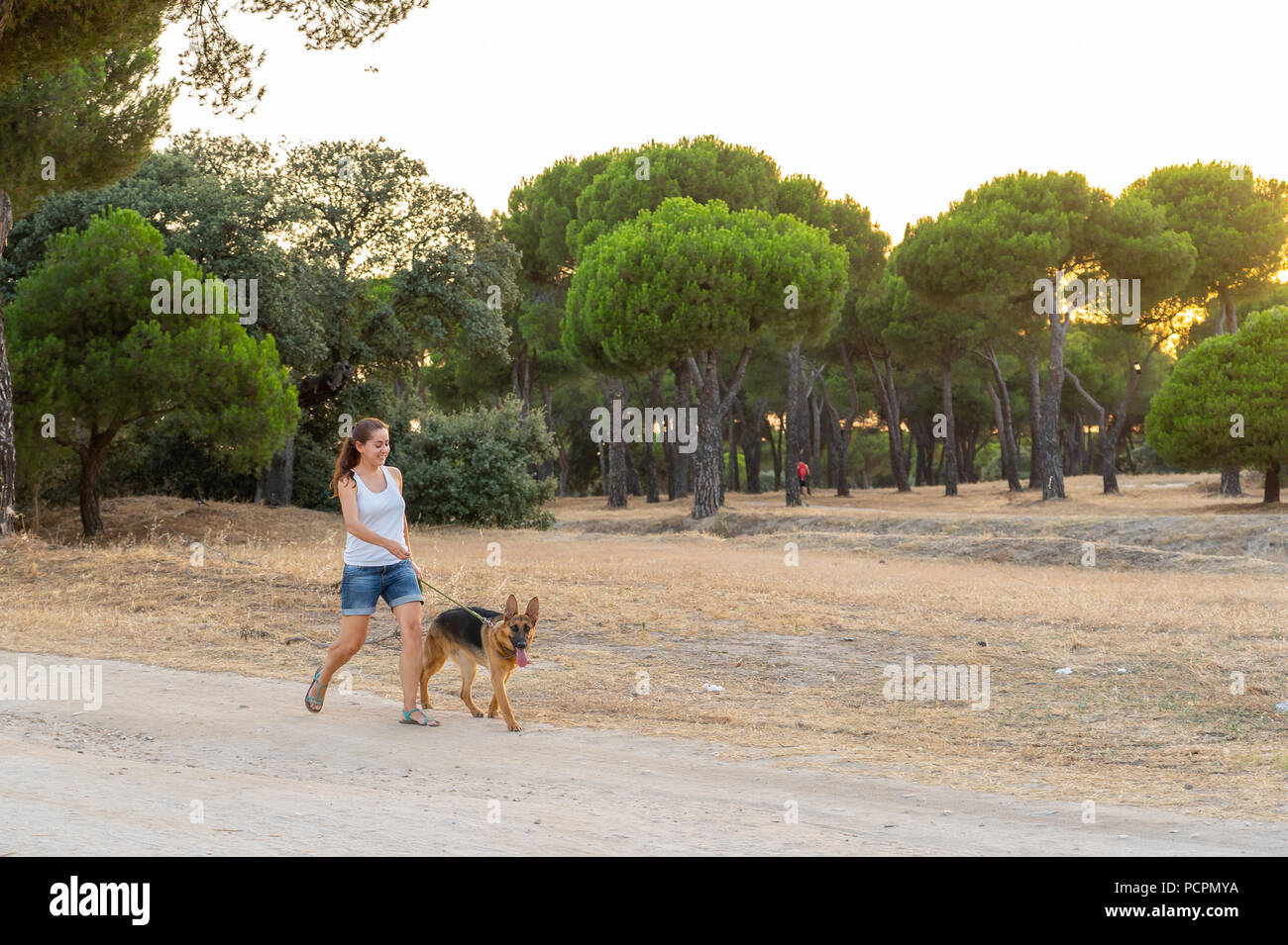 Young attractive latin woman walking with her beautiful cute german ...