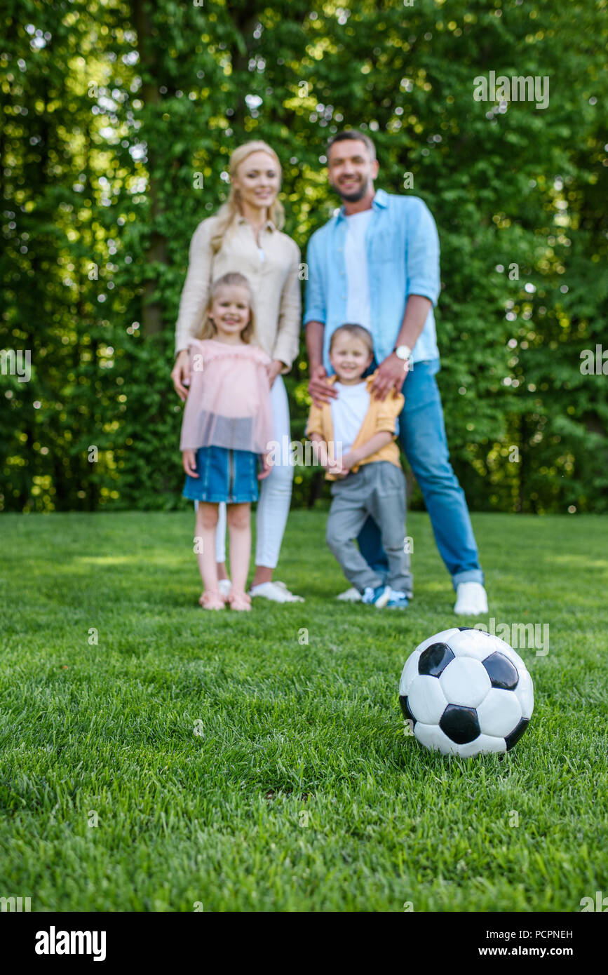 Family kids play soccer together hi-res stock photography and images ...