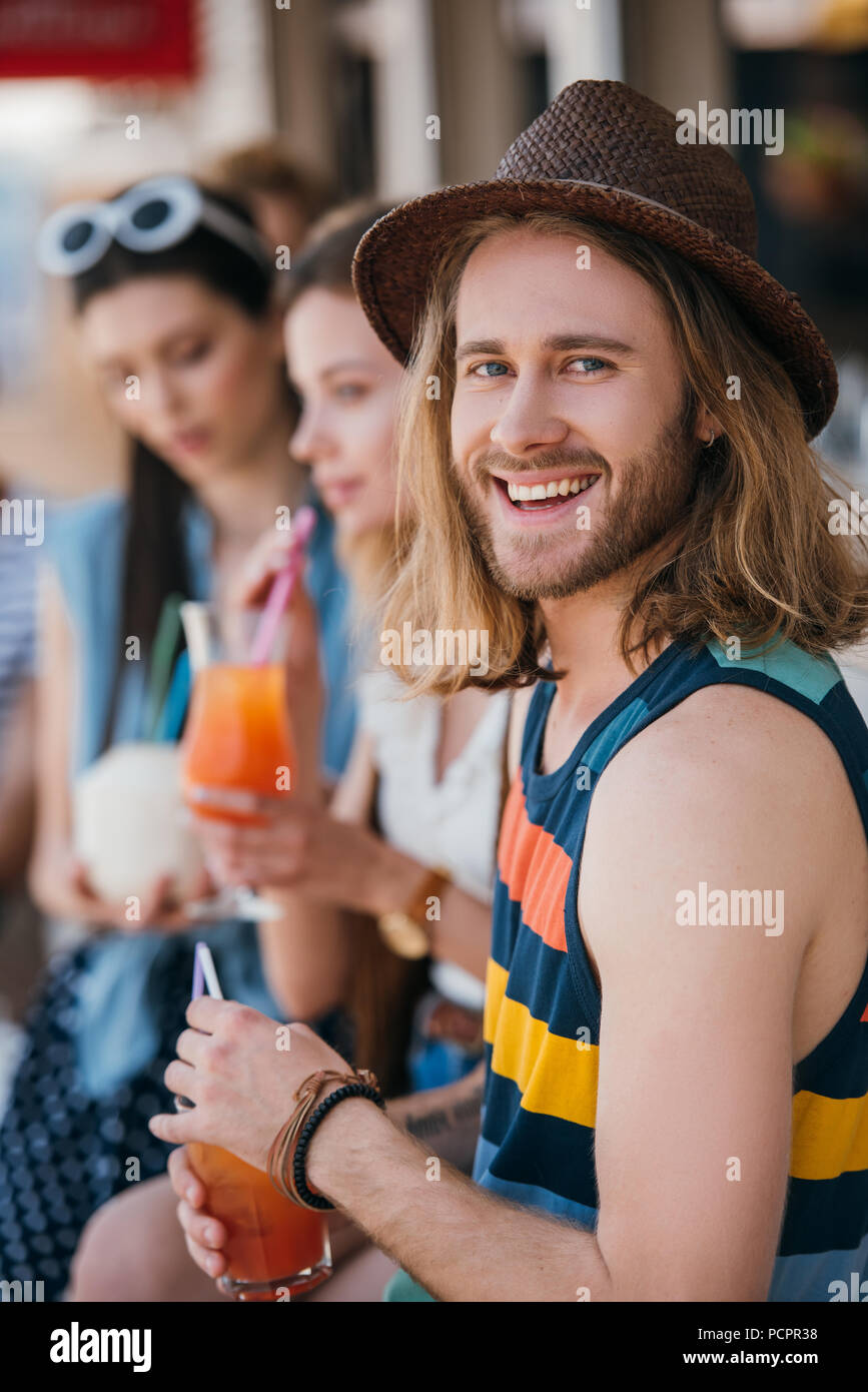 Man drinking cocktail beach hi-res stock photography and images - Alamy