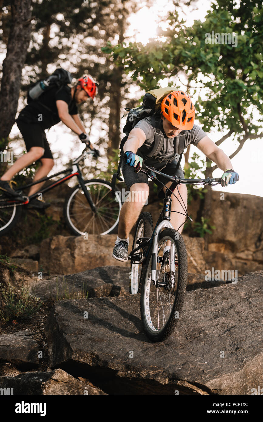 Young people performing tricks riding hi-res stock photography and ...