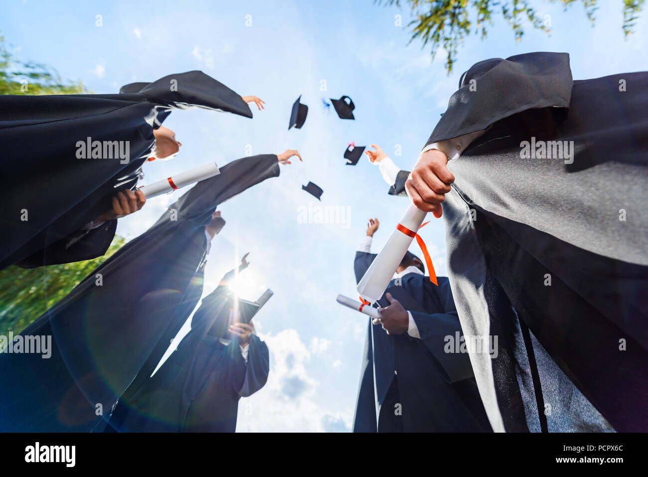 Students throwing their hats hi-res stock photography and images - Alamy