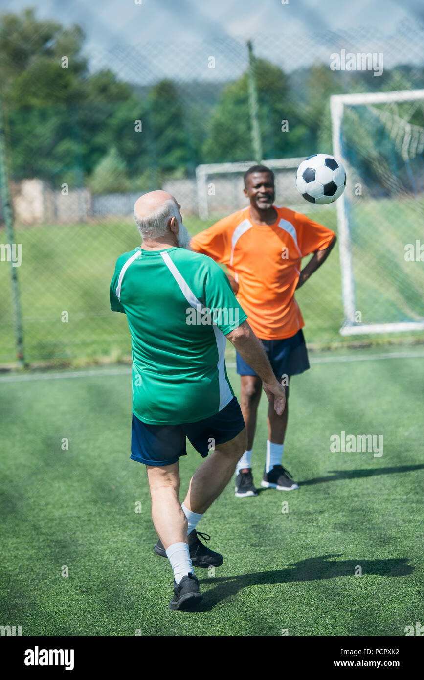 Old men playing soccer hi-res stock photography and images - Alamy