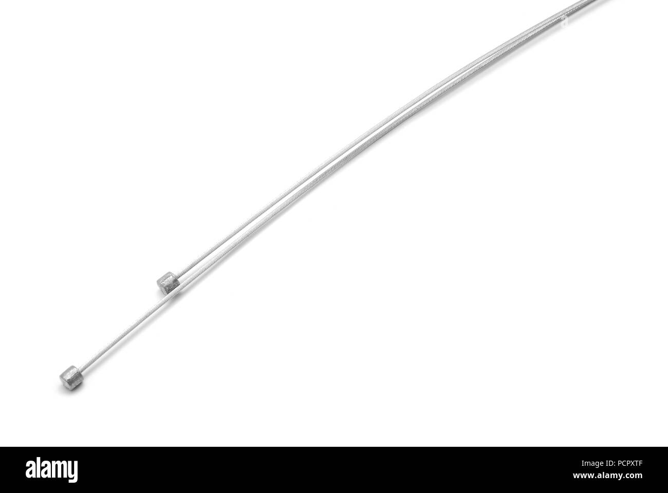 thin steel cable isolated on white Stock Photo - Alamy