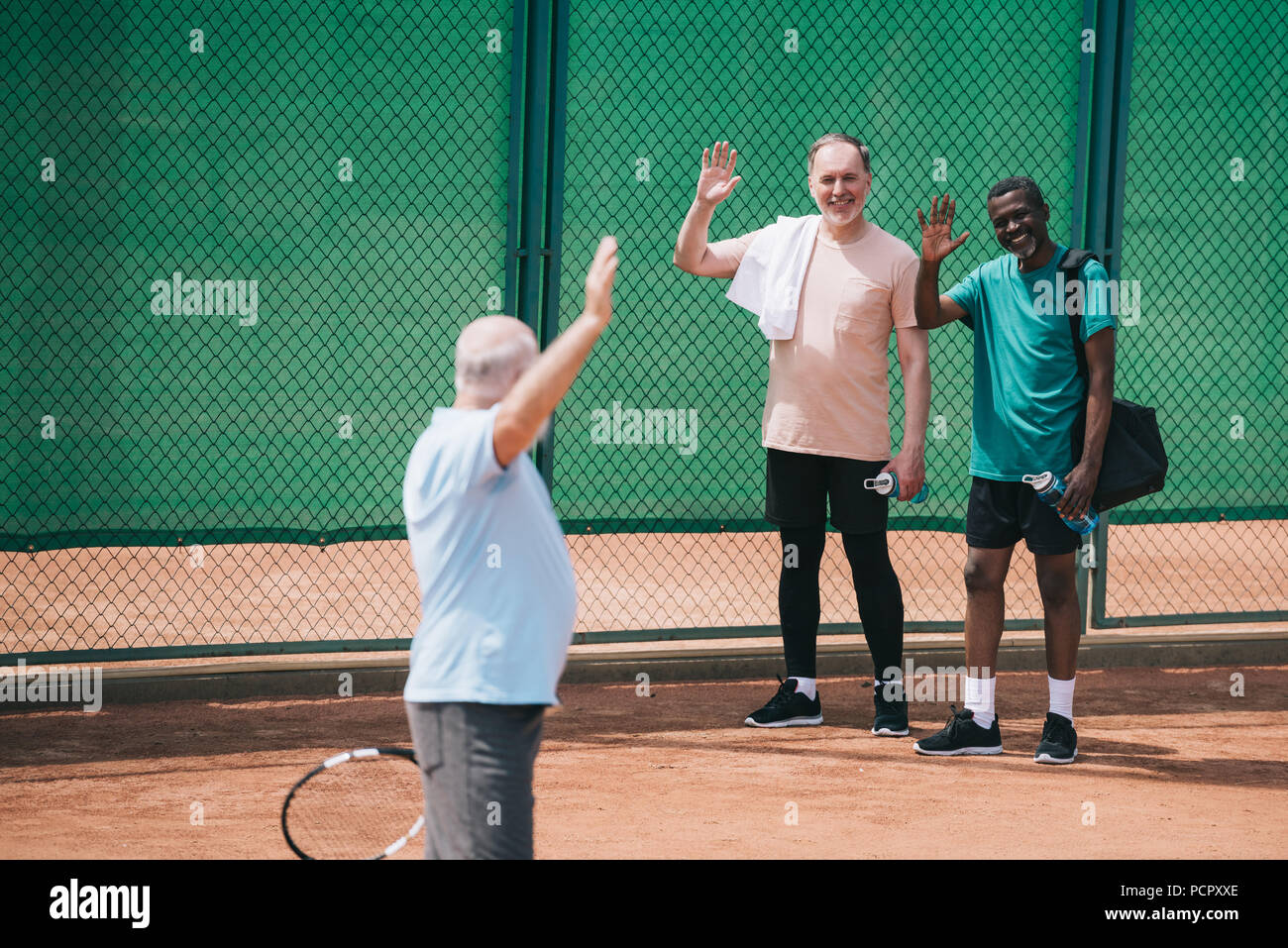 Old men greeting hi-res stock photography and images - Alamy