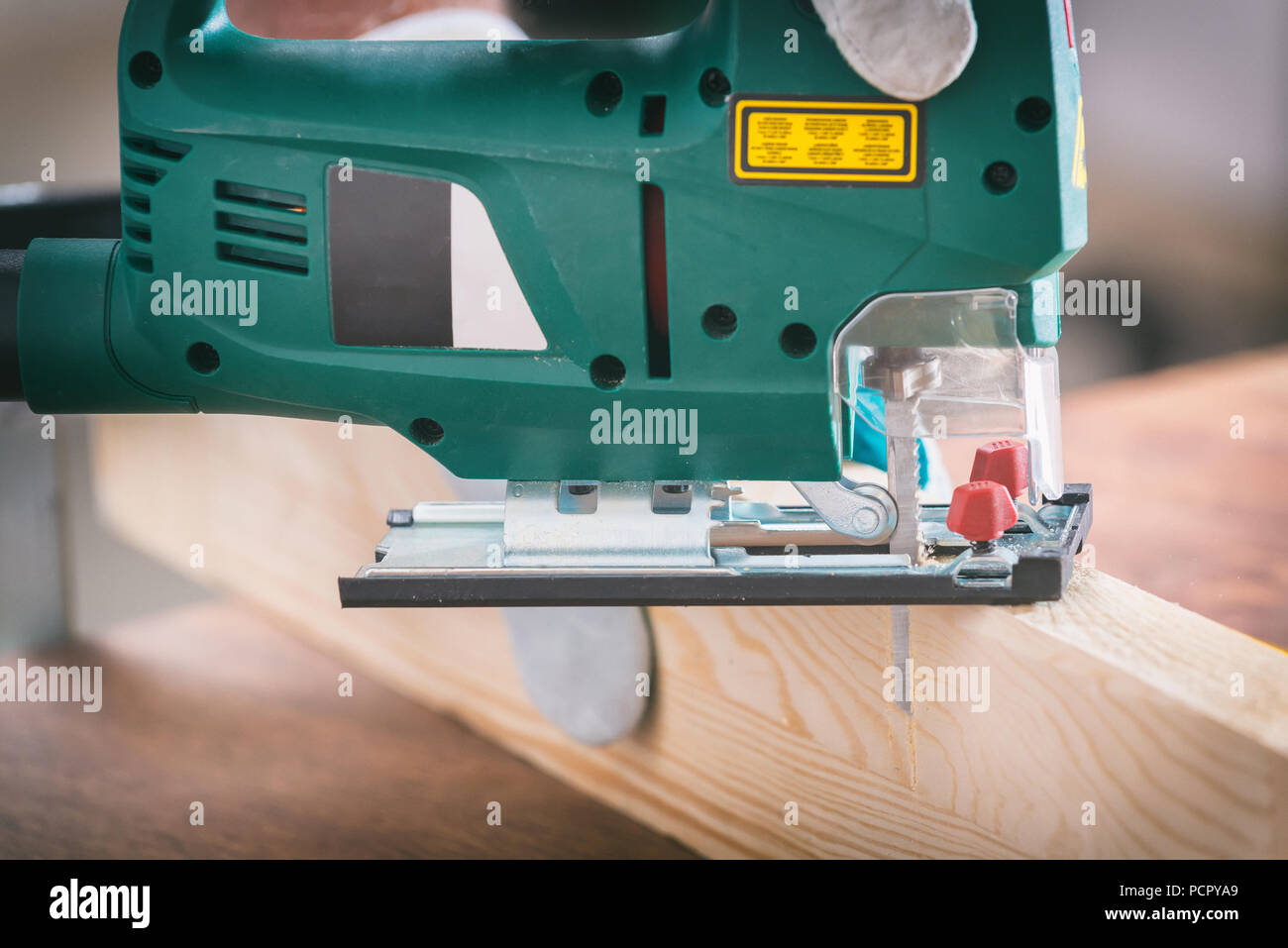 Using a jigsaw hi-res stock photography and images - Alamy