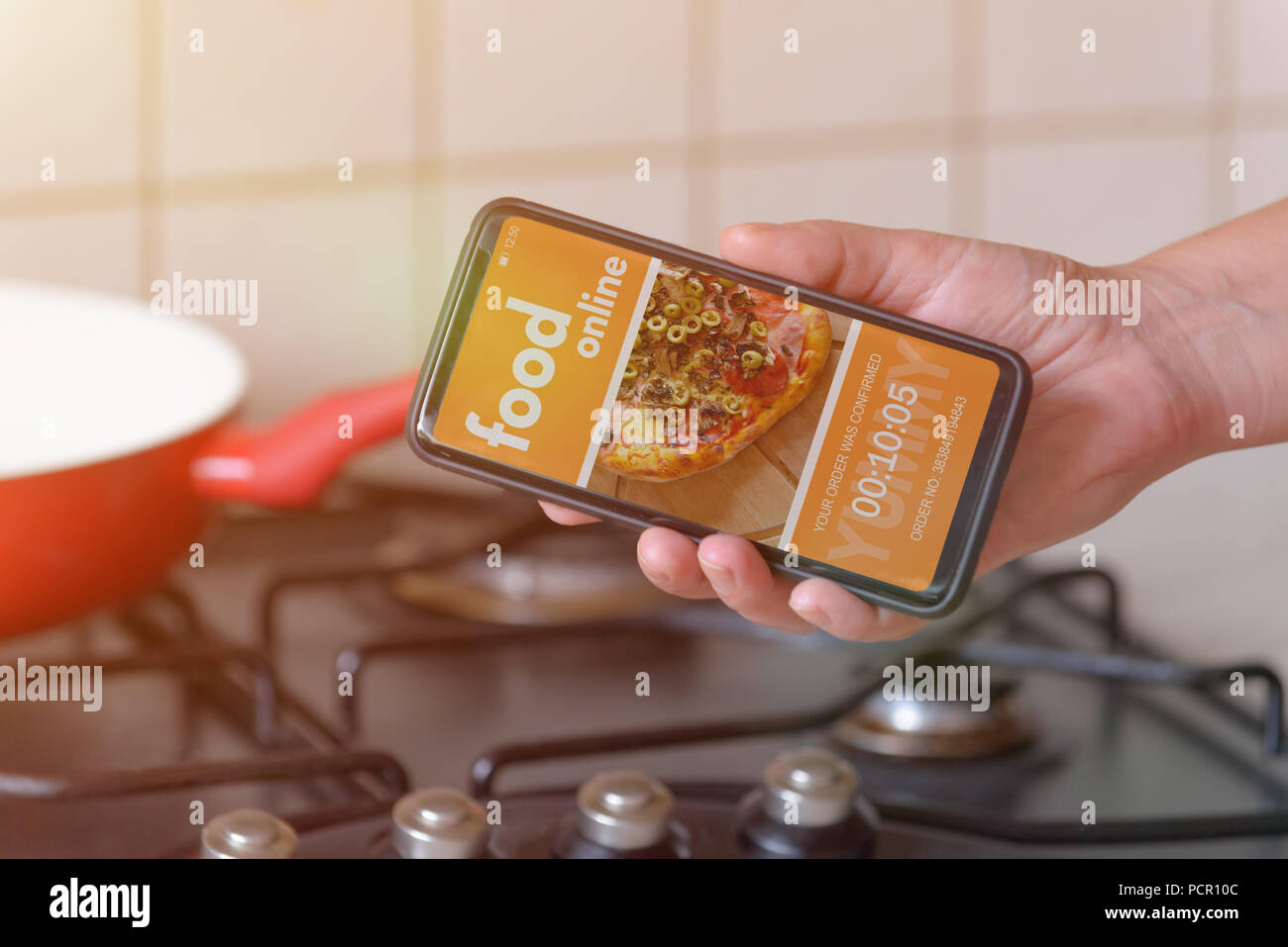 Ordering food online with smart phone at home Stock Photo - Alamy
