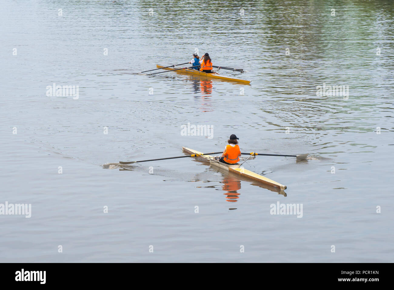 Young sportsmen in a boat, rowing on the river Rioni, Poti, Georgia ...