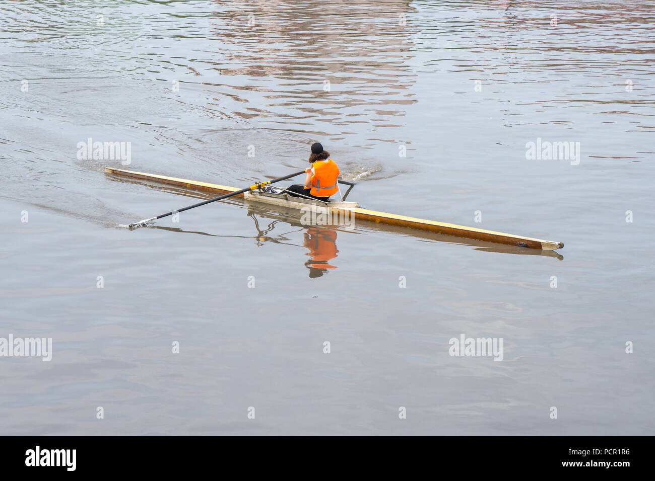 Young sportsmen in a boat, rowing on the river Rioni, Poti, Georgia ...