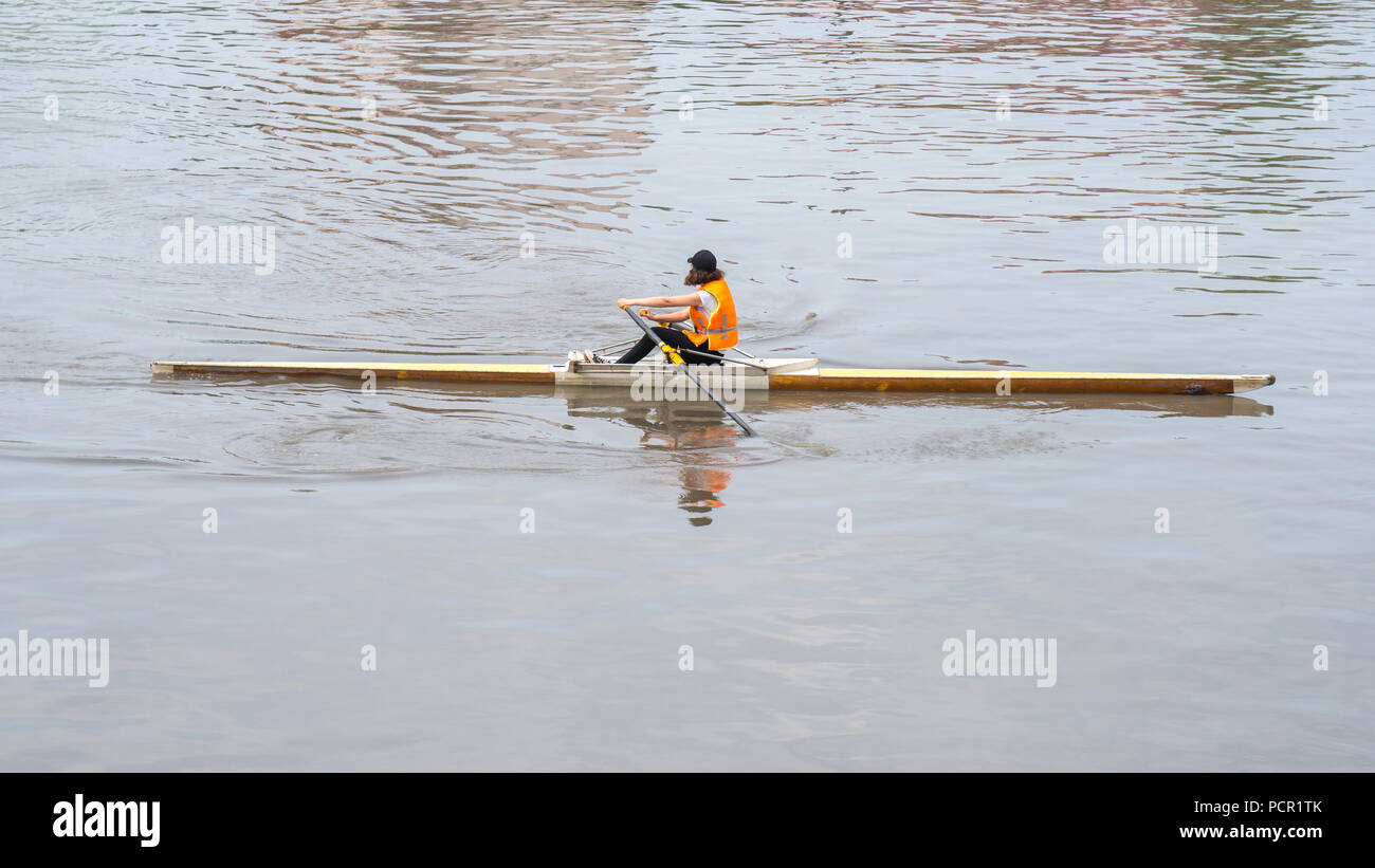 Young sportsmen in a boat, rowing on the river Rioni, Poti, Georgia ...