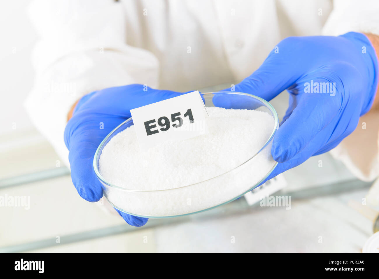 Researcher presenting preservatives substances that are added to ...