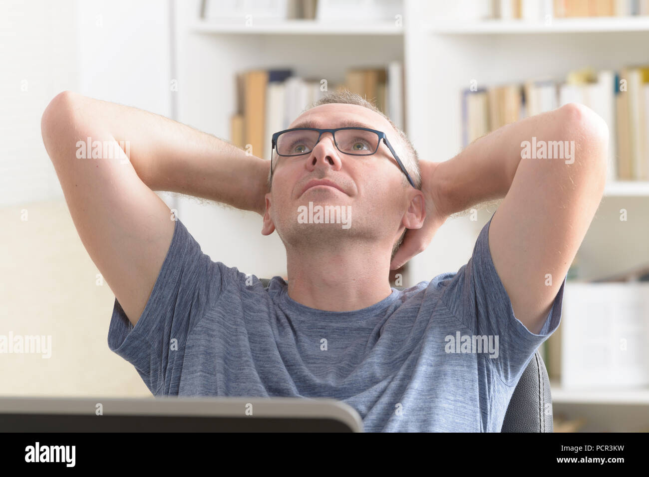 Man working an his home and taking a rest Stock Photo - Alamy