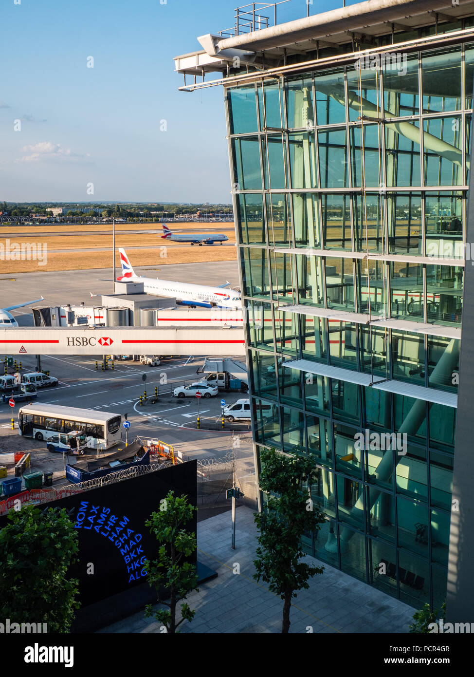 Exterior of Heathrow Terminal 5, with BA Airplanes, London, England, UK ...