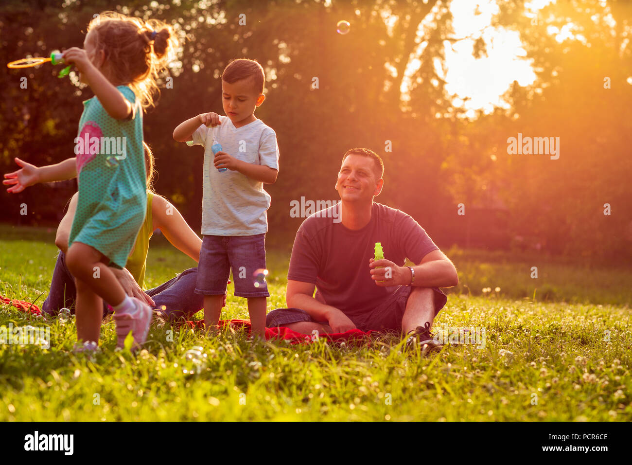 Father and son having fun with bubbles hi-res stock photography and ...