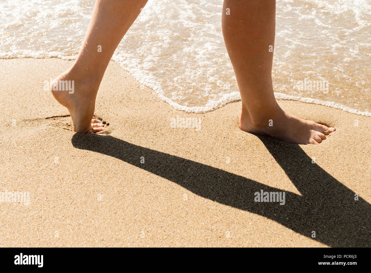 Female feet near the sea Stock Photo - Alamy