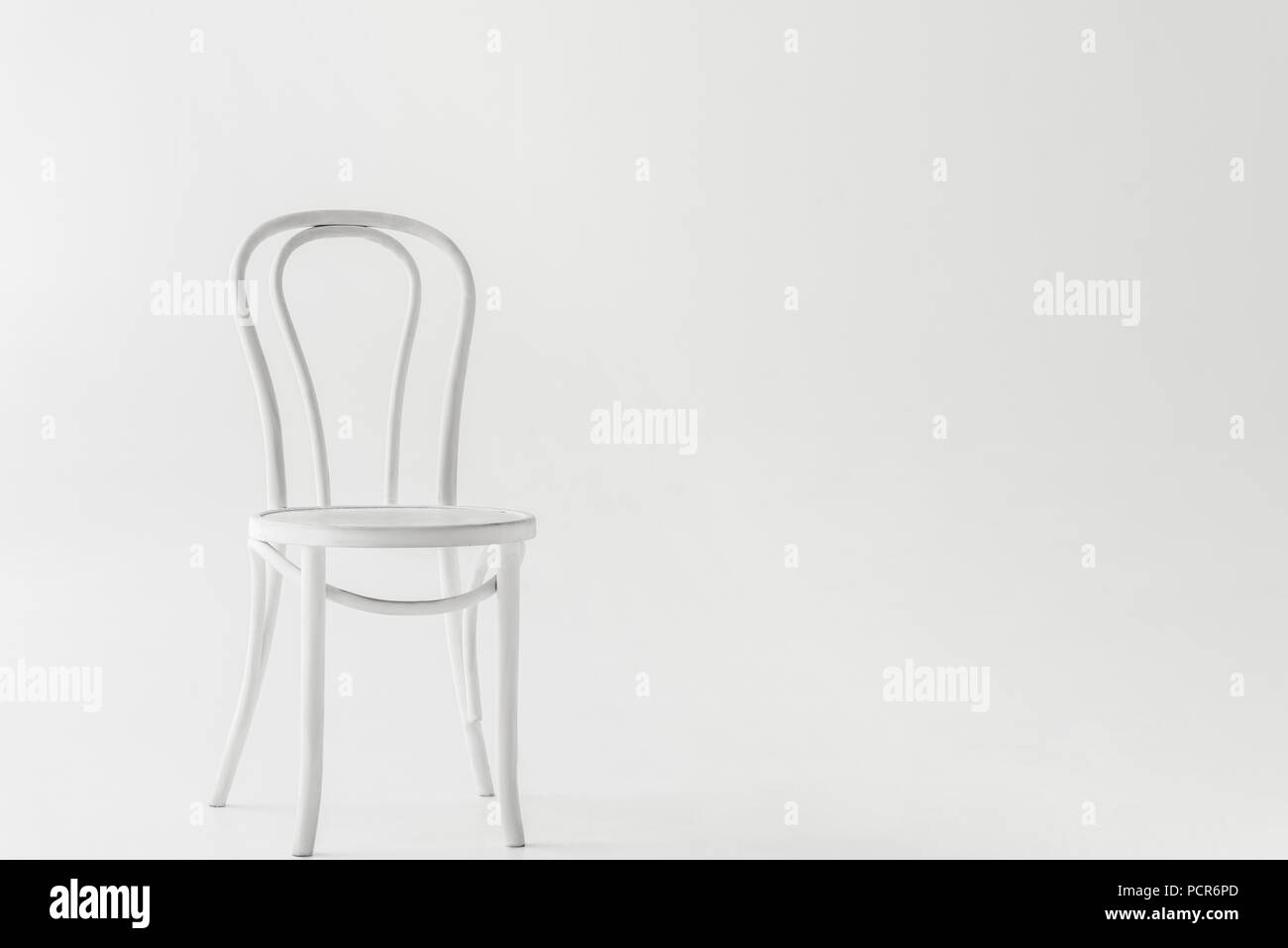 front view of white chair isolated on grey background Stock Photo - Alamy