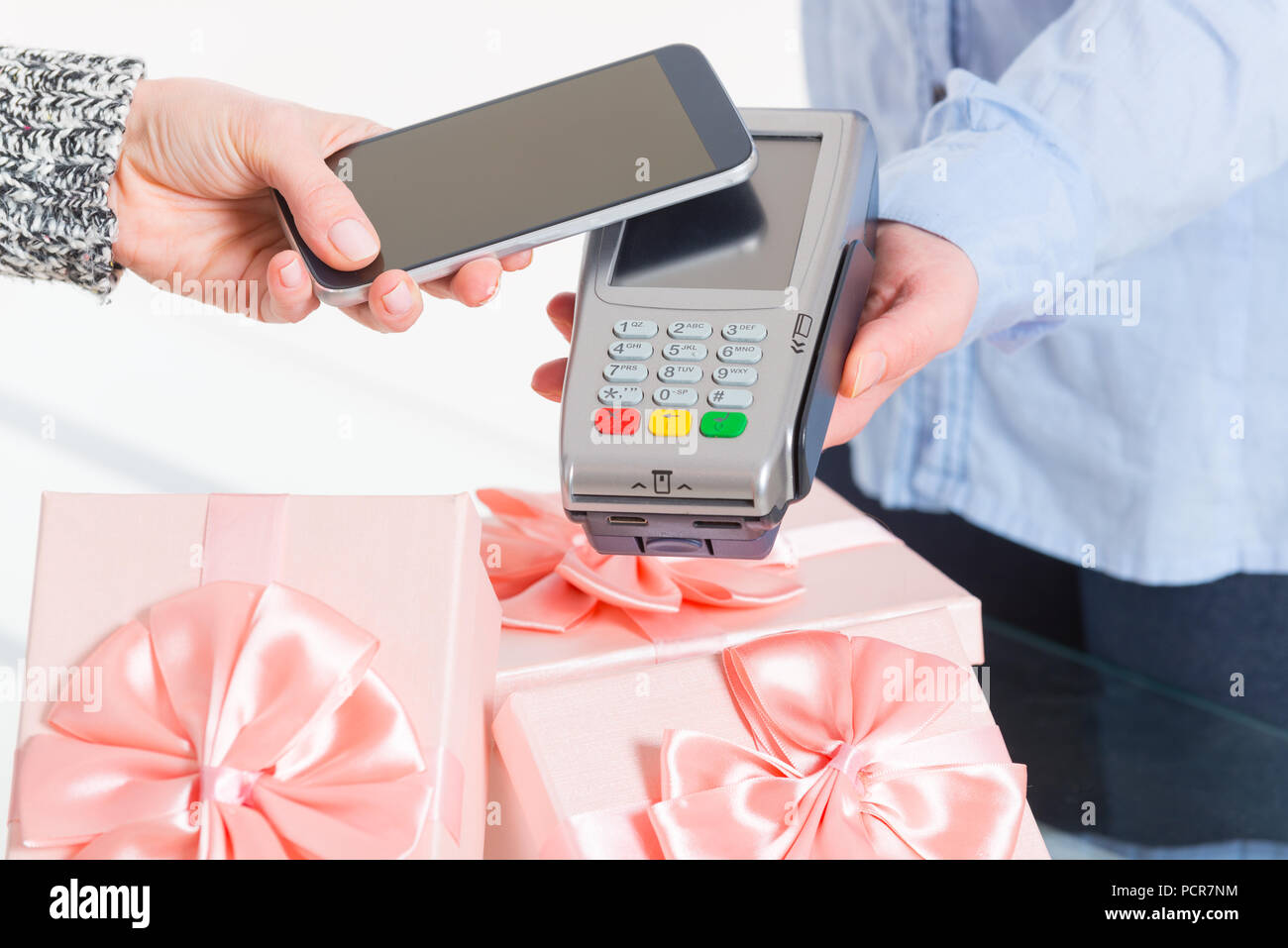 Making contactless payment for a gifts with smart phone over payment ...