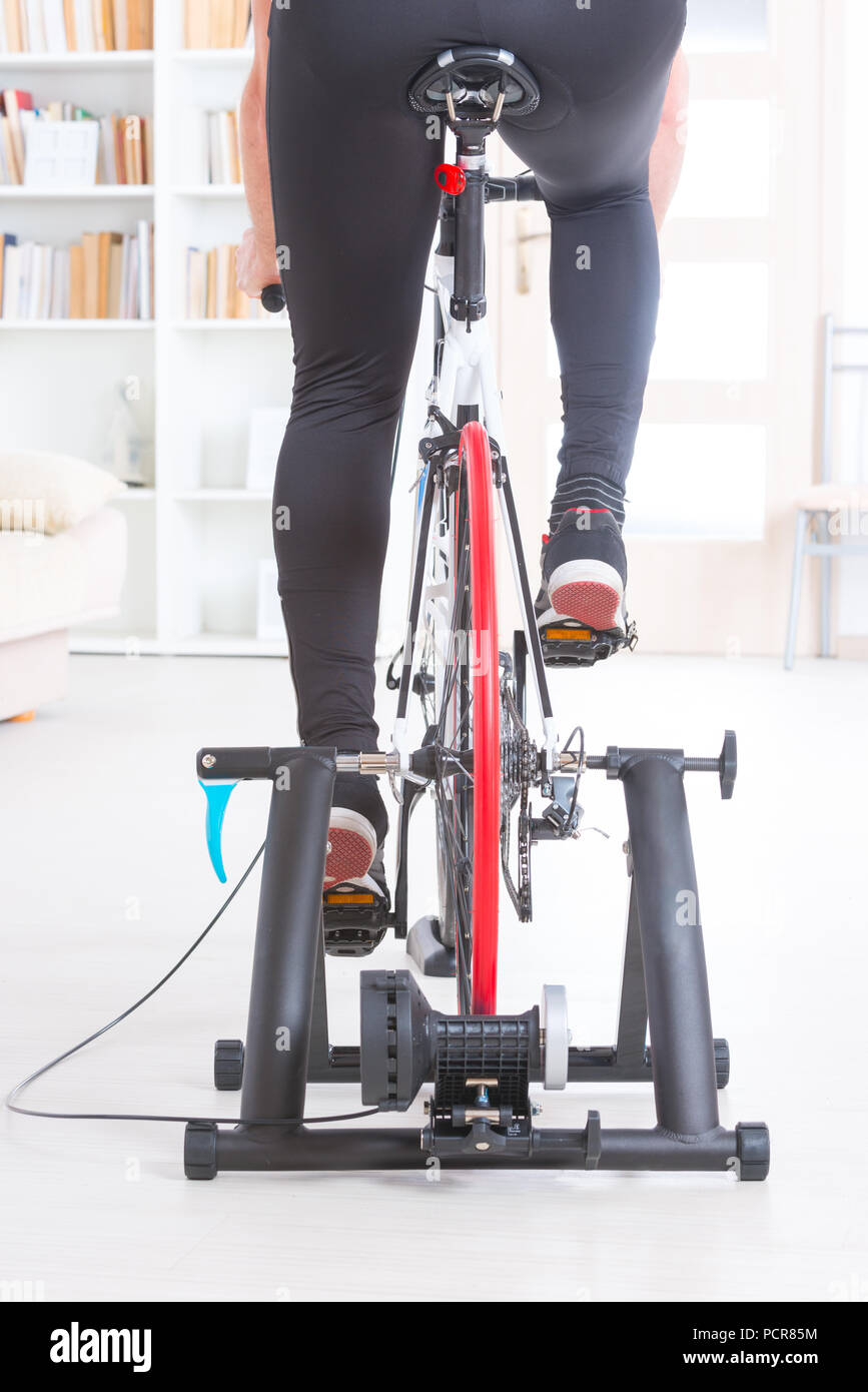 Adult man using bicycle exercise hi-res stock photography and images ...