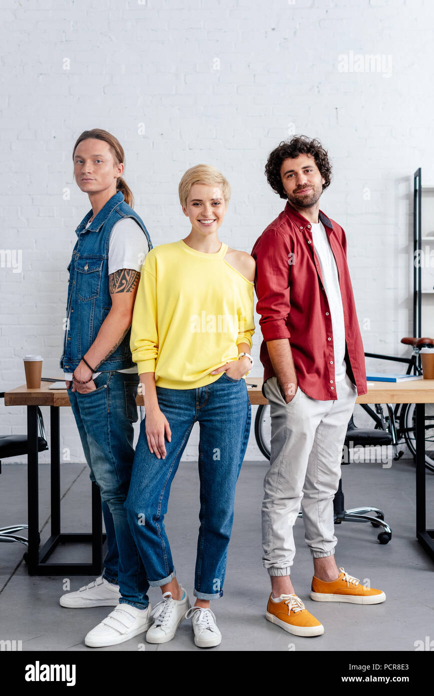 Business colleagues standing together hi-res stock photography and ...