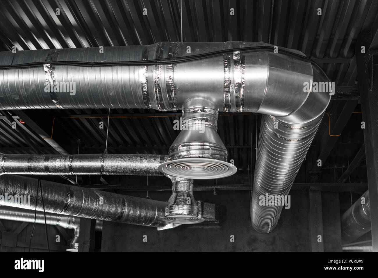 Ventilation system on the ceiling of large buildings. Ventilation pipes ...